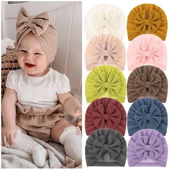 Pack of 4 turban caps for baby girl / soft caps for born baby | Daraz.pk