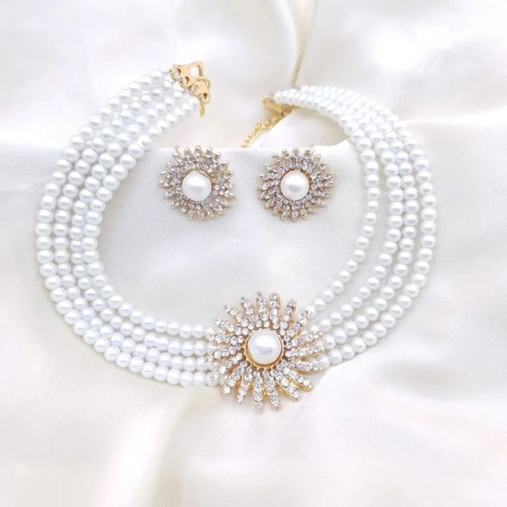Classy layered pearls necklace with sparkling crystal embedded ear ...