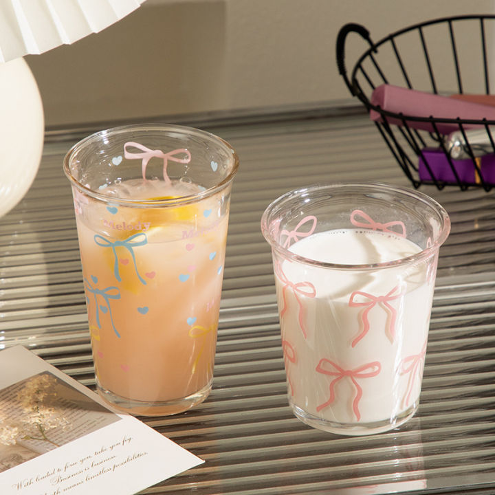Single glass cup with pink bow print, transparent glass, milk cup ...