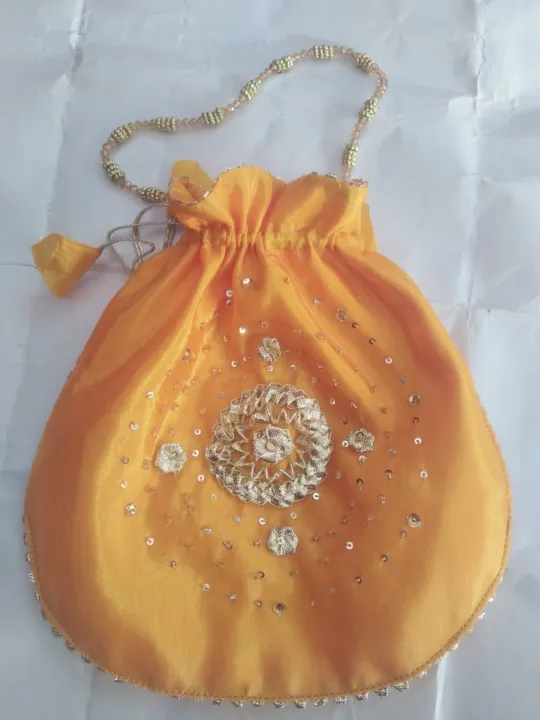 Fancy embroidered clutch/potli bag for wedding parties designer ...