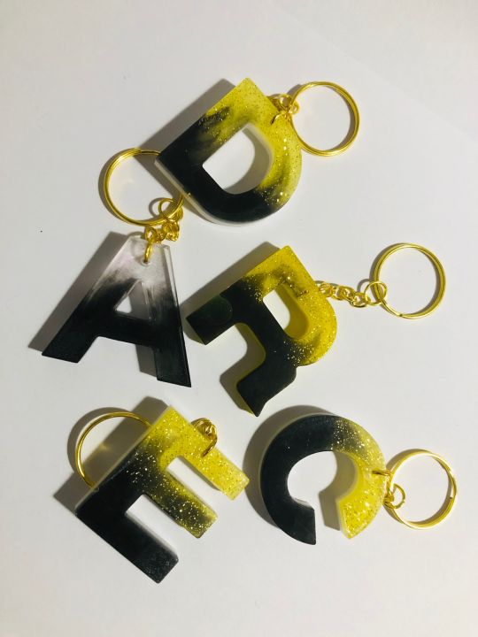Resin key tag Letters with gold chain | Daraz.lk