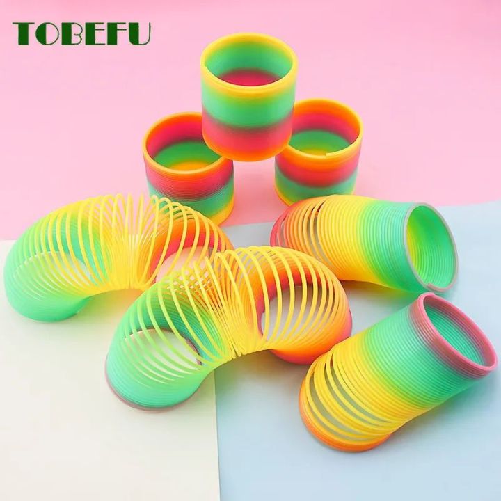 Rainbow Color Stretching Slinky Spring Toy For Toddlers and Kids ...