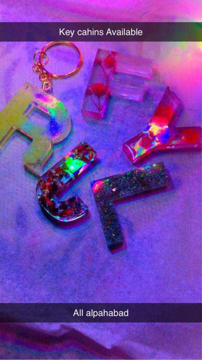 Fancy key chain available in all alphabad which is made by rezin fully ...