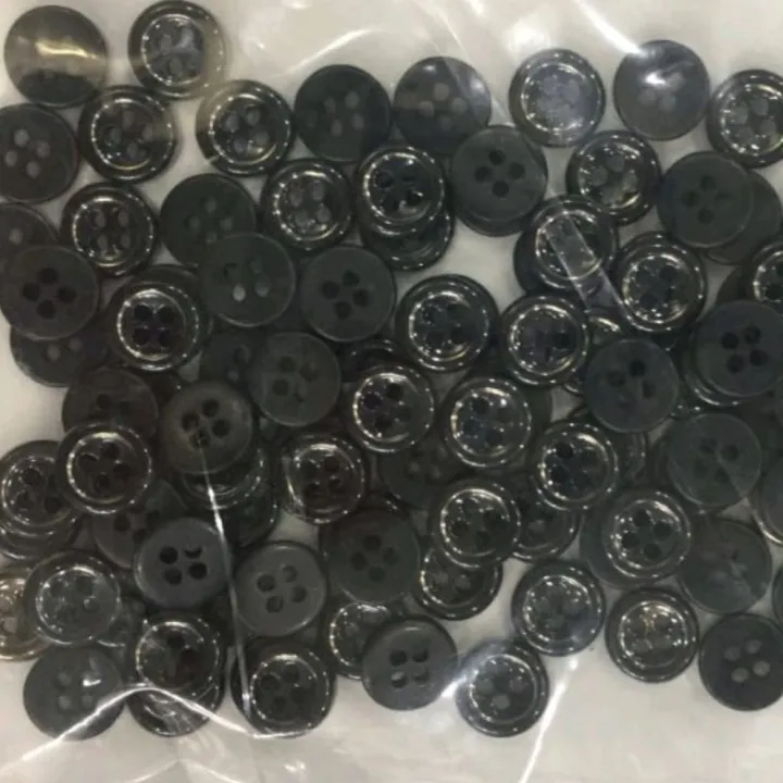 Shiny black plastic buttons 4-hole 100-piece pack | Daraz.pk