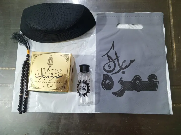 pack of set 1 umrah taburak bag1 cap 1tasbee 1zamzam. bottle 1kajor box ...