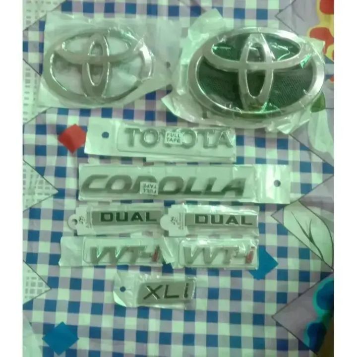 Toyota Corolla Xli Chrome Plastic Logo with Monogram 2009-14 Front Logo ...