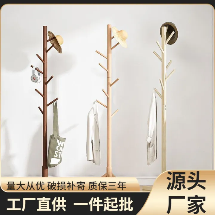 Solid wood coat rack floor-to-ceiling vertical hanger in bedroom ...