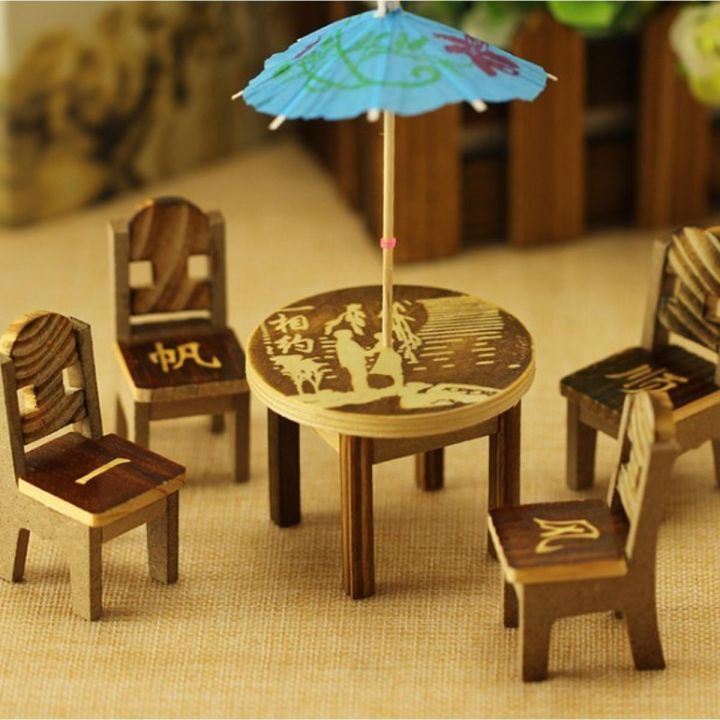 showpiece Chair Set includes 4 chairs, 1 table, and 1 umbrella. - home ...