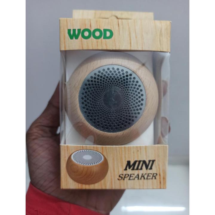 Wood bluetooth mini speaker round shape | Daraz.com.bd
