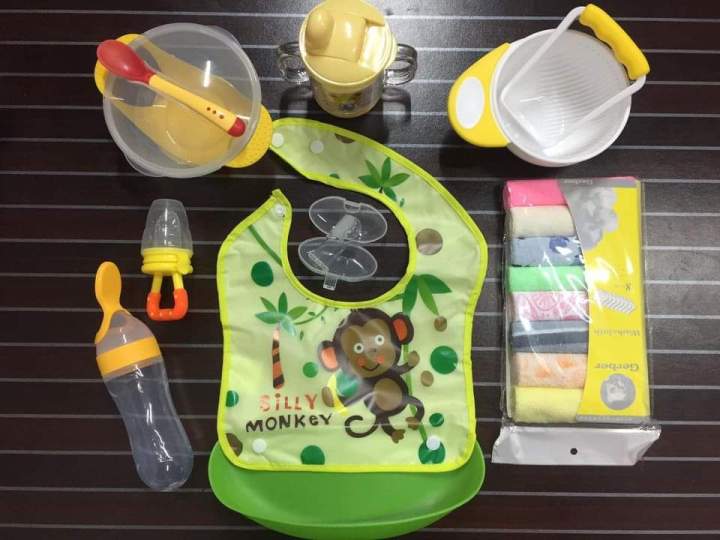 8-piece baby feeding set with essential accessories Includes a Mash ...
