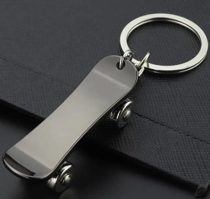 Metal Skateboard with Slide able Wheel Keychain | Daraz.lk
