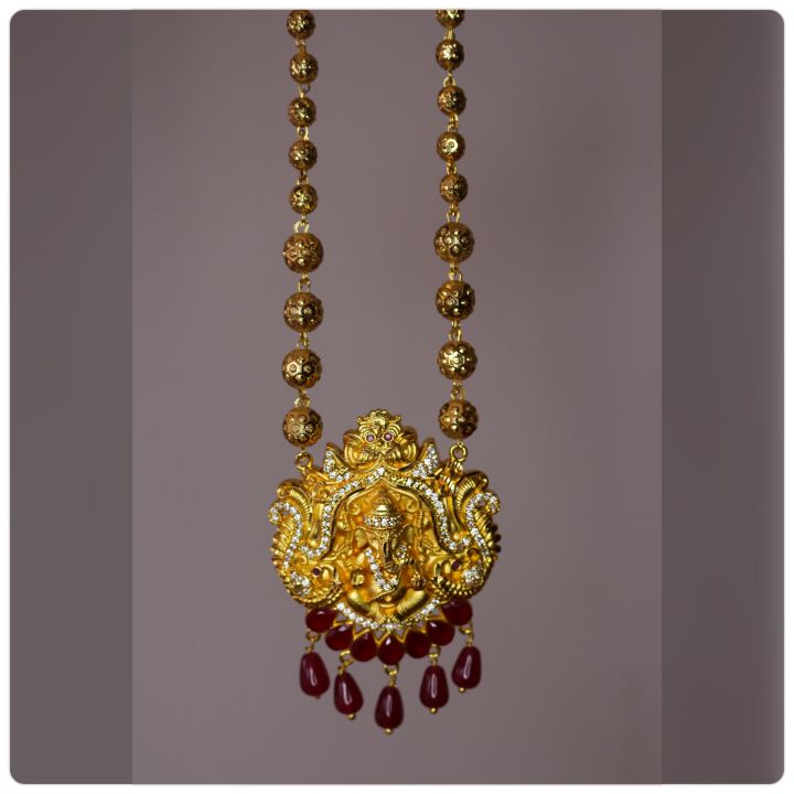 Ganesh Panchadhatu Locket with Ruby Stones | Daraz.com.np
