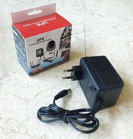 2 Hrs Backup For Router Universal Charger 12V to 9v auto (UPS) Plus ...