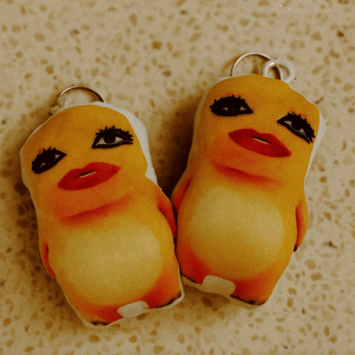 Fashion Little Milk Dragon Squeeze Sound Keychain Dinosaur Nailong ...