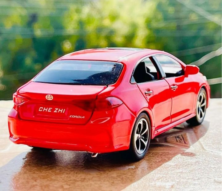 Die Cast Toyota Corolla Altis Grande Car Toy Scale1:32 Color Red | Daraz.pk
