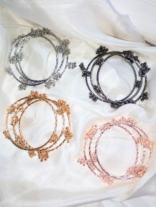 Luxury Metal Bangles Set with Tussles Twisted Designated from Seek for ...