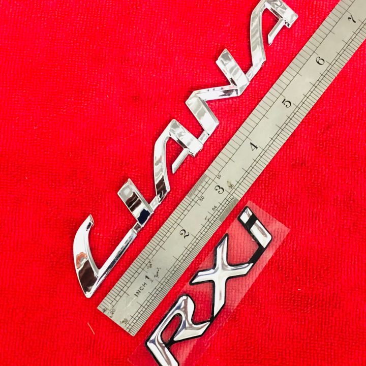 Suzuki Liana RXI rear Emblem chrome plastic and sticker 02 pcs | Daraz.pk