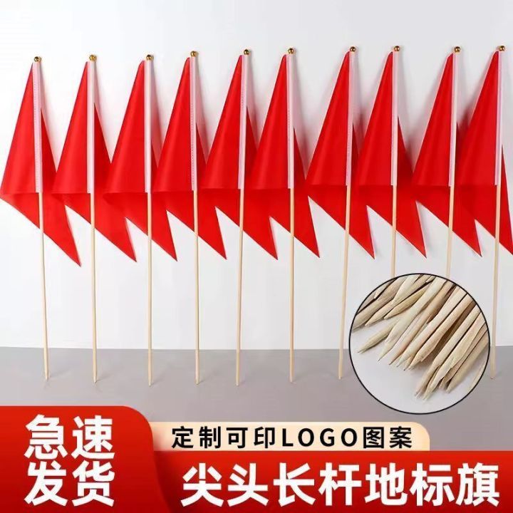 Sharp small red 80 cm 1 m long pointed bamboo pole inserted ground ...
