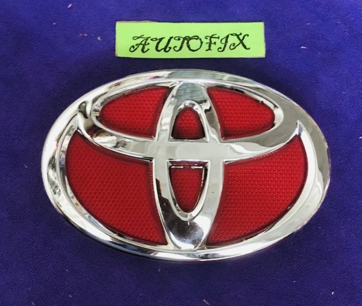 Toyota Corolla 2010-12 front grill logo red n silver 01 PC | Daraz.pk