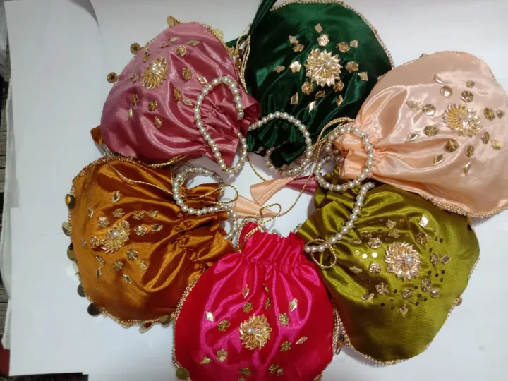fancy Potli for wedding parties designer traditional clouth gol bag ...