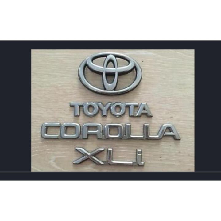 TOYOTA COROLLA XLI REAR BADGE LOGO EMBLEM SILVER 8.40cm X 5.70cm SET ...