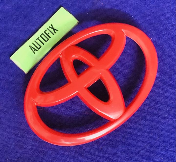 Toyota Corolla 2012 Onwards front plastic Logo Red 01 PC | Daraz.pk