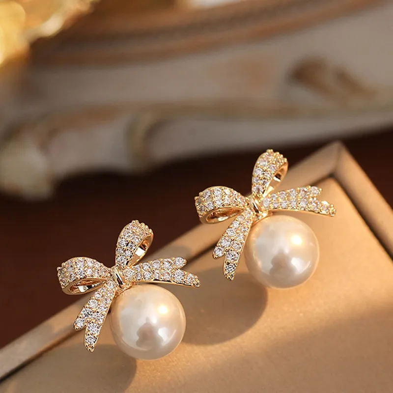 Bow sparkle diamond pearl stud earrings women s Dongdaemun luxury earrings in South Korea versatile temperament delicate earrings wholesale Daraz.pk