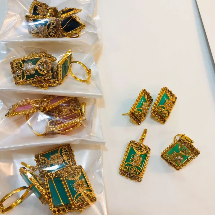 New stylish earrings and Ring and locket for girls set of jewellery ...