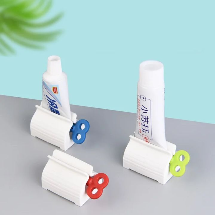 Standing Tube / Toothpaste Squeezer ( 1 Piece - Random Color ) | Daraz.pk