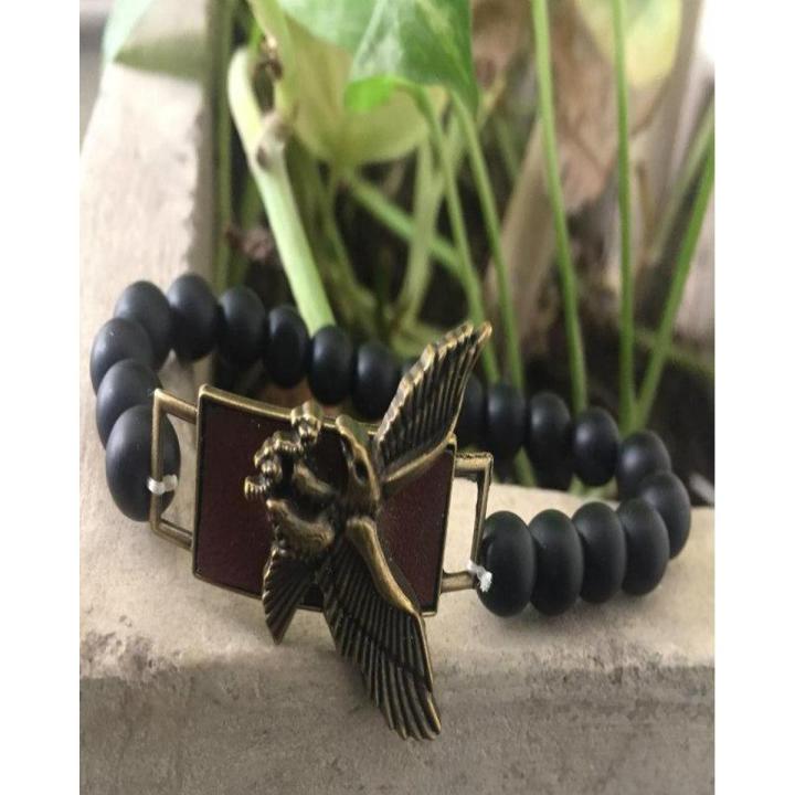 Hawk bracelet in wooden beads material | Daraz.pk