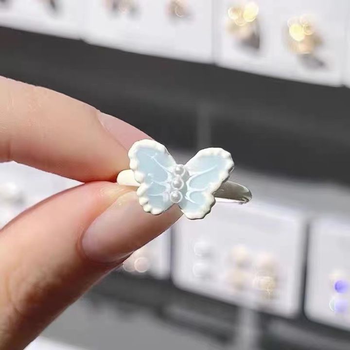 Youbo Milk Whirling ~ Light Blue Pearl Butterfly Ring Female Style ...