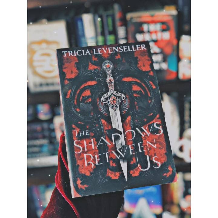 The Shadows Between Us by Tricia Levenseller A Novel | Daraz.pk