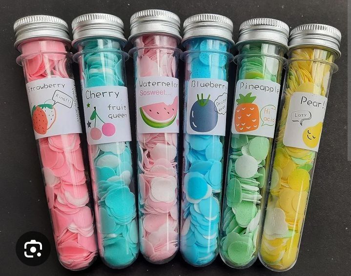 Portable paper soap sheets packaged in test-tube-shaped containers ...